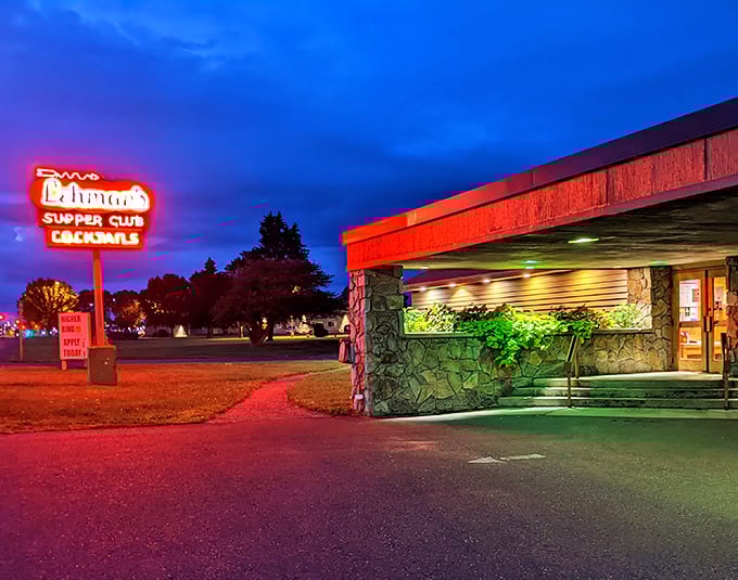 That iconic neon glow against the twilight sky isn't just a sign—it's a promise of Wisconsin supper club magic waiting inside.