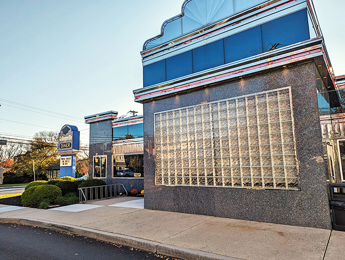 That classic diner architecture promises comfort food adventures waiting just beyond those welcoming glass doors.