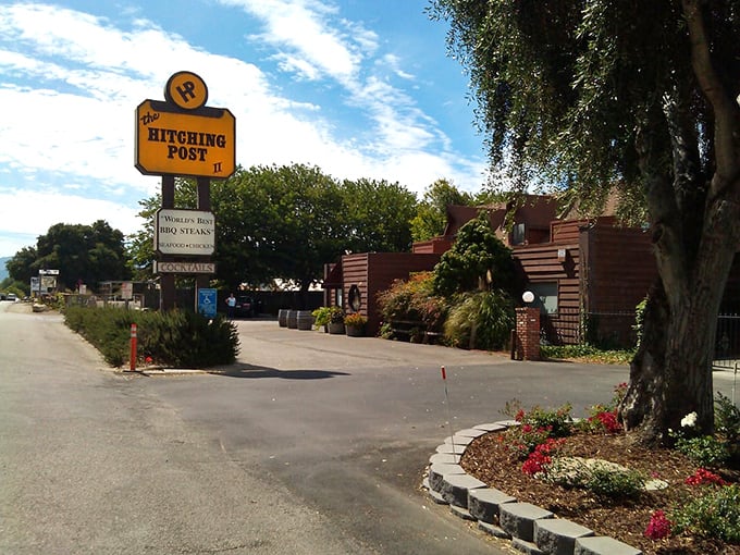The burgundy-roofed roadside treasure that's been saving hungry travelers from fast food regret for decades. California's eucalyptus trees stand guard over this steak sanctuary.