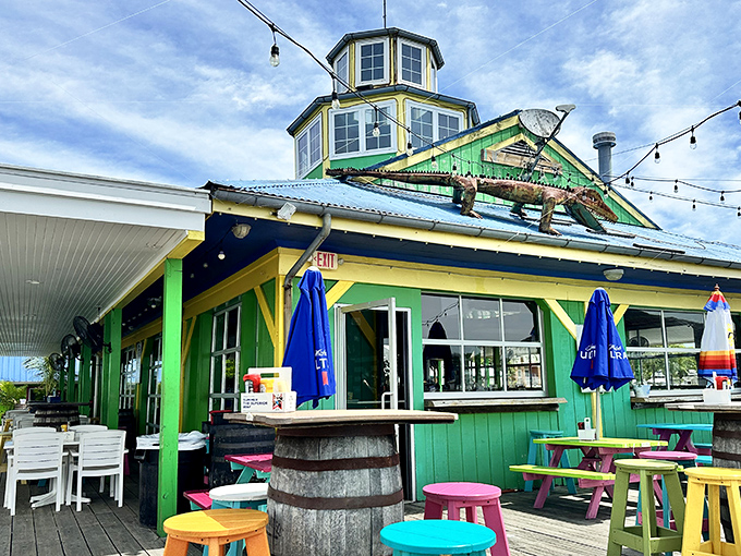 Candy-colored stools against seafoam green walls – The Jetty's exterior is like a Jimmy Buffett song come to life on Maryland's Eastern Shore.