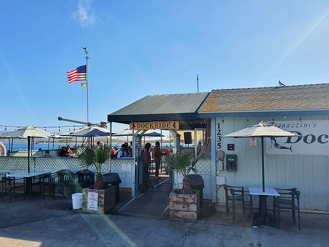 The weathered sign and American flag welcome you to seafood paradise. Morro Bay's best-kept secret sits unassumingly at the water's edge.