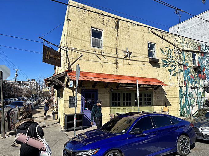 The unassuming exterior of Honey's Sit 'n Eat belies the culinary treasures within. Weekend warriors, prepare to wait in line—it's worth every minute.
