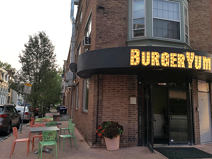 That marquee sign isn't just illuminated—it's making a promise your taste buds will thank you for keeping. Corner charm at its finest.