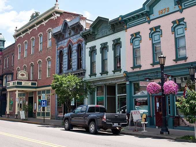 Downtown Millersburg's Victorian-era storefronts stand like colorful soldiers, guarding the town's rich history while welcoming modern visitors with open doors.