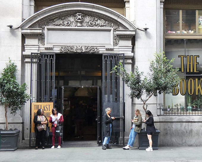 The grand entrance to The Last Bookstore beckons like a literary temple, complete with classical architecture and the promise of adventures within.