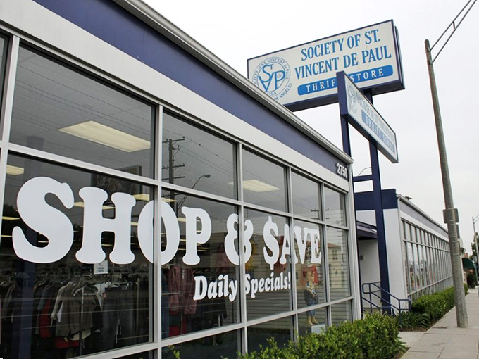 The blue and white storefront promises "Shop & Save" – not just a slogan but a sacred covenant between you and your wallet.