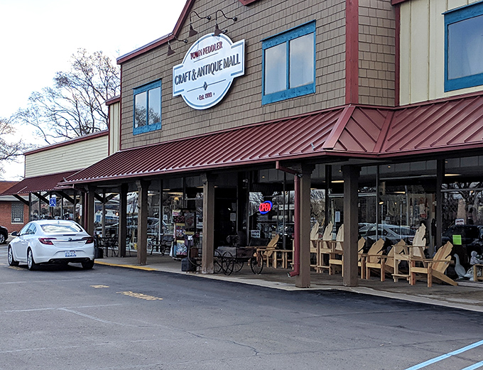 The unassuming exterior of Town Peddler belies the treasure trove within—like finding a portal to the past disguised as a strip mall storefront.