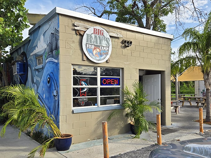 The little concrete block building that could! Big Ray's exterior mural tells you everything – this place takes fishing (and fish) seriously.
