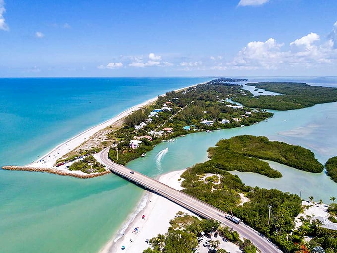 Aerial paradise doesn't begin to describe this curved slice of heaven. Nature's masterpiece where the Gulf of Mexico delivers seashells like a daily gift subscription.