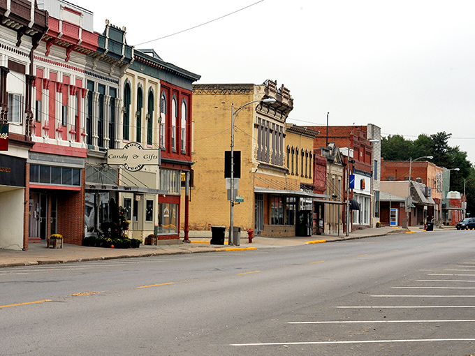 The stately courthouse stands like a proud parent watching over Main Street, its columns a reminder that small-town America still knows how to make an architectural statement.