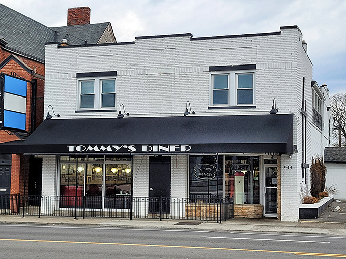 The classic white brick exterior of Tommy's Diner stands like a time capsule on West Broad Street, promising comfort food and nostalgia in equal measure.