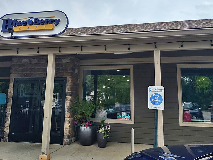 The Blue Berry Café's charming exterior promises breakfast adventures that'll make your morning commute worthwhile.