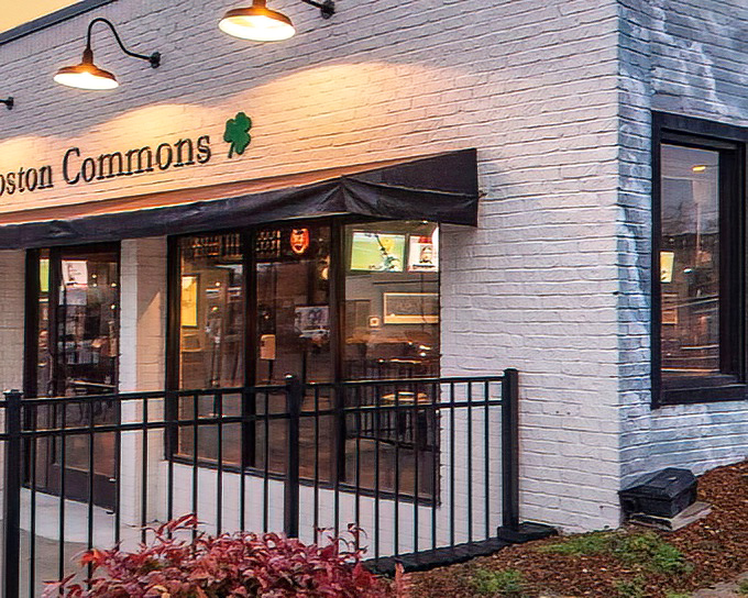 Boston Commons welcomes you with its charming white brick façade, shamrock accents, and inviting bench—the perfect prelude to the British-Irish culinary adventure waiting inside.