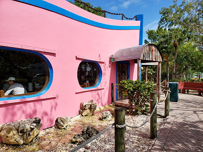 The flamingo-pink exterior isn't just eye-catching—it's a promise of the colorful culinary experience waiting inside this Sanibel Island gem.