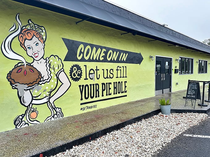That cheerful mural promises pie-hole satisfaction, and trust me, this place absolutely delivers on every delicious word.