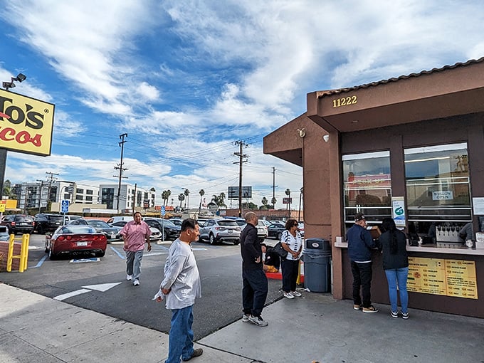 The pilgrimage begins here: Tito's iconic brown stucco exterior, where Angelenos have been lining up for decades to satisfy their hard-shell cravings.