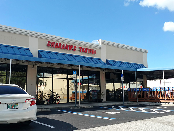 Charann's Tavern welcomes you with its distinctive blue awnings and bold red signage – like a beacon for sandwich seekers in this unassuming Tampa strip mall.