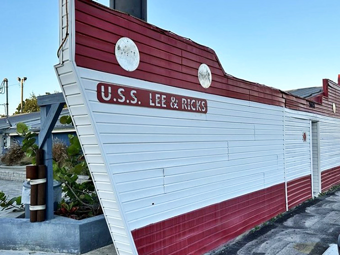 The U.S.S. Lee & Rick's sails proudly on dry land, its boat-shaped exterior promising seafood treasures within. No fancy harbor needed—just an appetite for adventure.