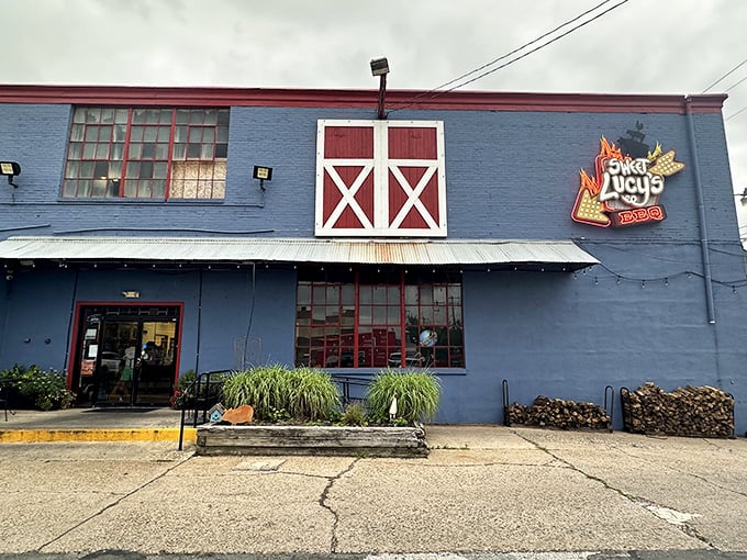 The barn-red door and blue exterior of Sweet Lucy's isn't shouting for attention—it's too busy perfecting what's smoking inside.