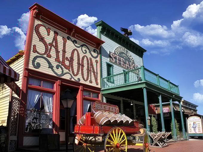 The Wild West isn't dead—it's alive and kicking at Pinnacle Peak's vibrant facade, where that eagle perched atop seems to be guarding the best steaks in Tucson.
