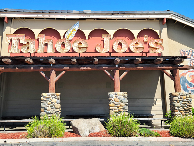 The iconic Tahoe Joe's sign welcomes hungry travelers like a mountain oasis in Fresno's urban landscape. Those stone pillars aren't just for show—they're holding up decades of steak-loving traditions.