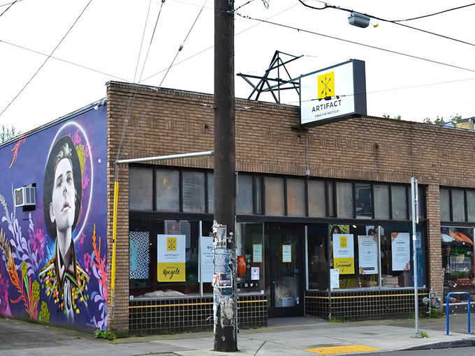 The brick building with its vibrant mural makes a statement before you even step inside – Portland's artistic spirit on full display.