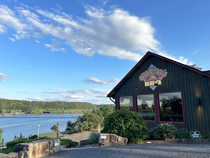 Perched along the Susquehanna River like a green sentinel of smoke and flavor, Skeeter's BBQ offers a view that rivals the food—almost.