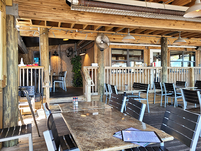 Rustic wooden beams and salt-kissed pillars aren't designer touches—they're the real deal at this dockside haven where authenticity isn't manufactured, it's marinated. 