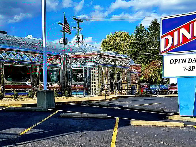 The gleaming stainless steel exterior of Maddy's Diner 23 shines like a beacon of hope for hungry travelers. Classic Americana at its finest.