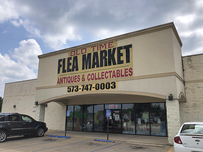 The unassuming exterior of Old Time Flea Market belies the treasure trove within—like finding a gourmet meal at a gas station, the surprises await inside.