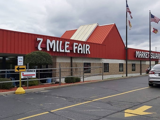 The iconic red-roofed entrance to 7 Mile Fair stands like a retail Narnia wardrobe—step through and enter a world of endless possibilities.