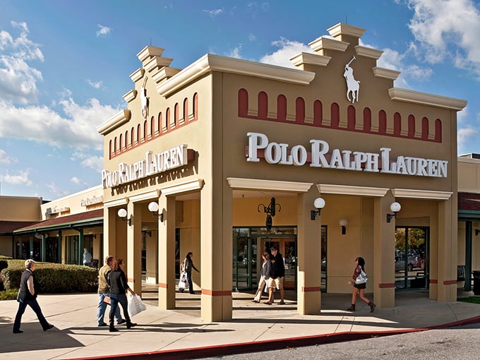 The retail promised land awaits! Calvin Klein and Banana Republic stand like sentinels at the entrance to Hagerstown Premium Outlets, beckoning bargain hunters with architectural flair.