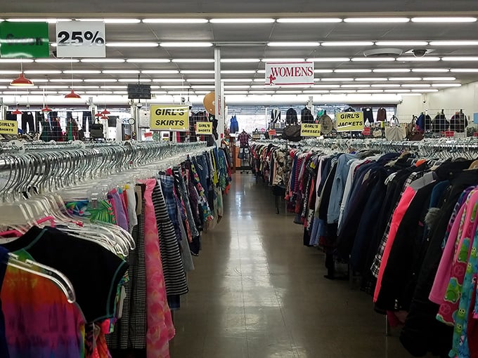 A sea of colorful racks and humble signs calls out like a siren song—no velvet ropes, just pure thrift treasure hunting.