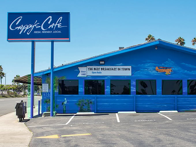 The iconic blue exterior of Cappy's Café stands out like a beacon of breakfast hope on Newport Beach's coastline.