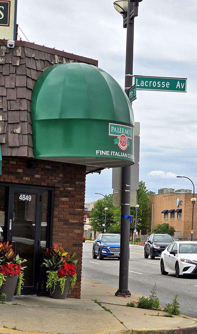That iconic green awning at Palermo's 95th isn't just a landmark—it's a beacon of hope for hungry souls seeking pizza salvation in Oak Lawn.