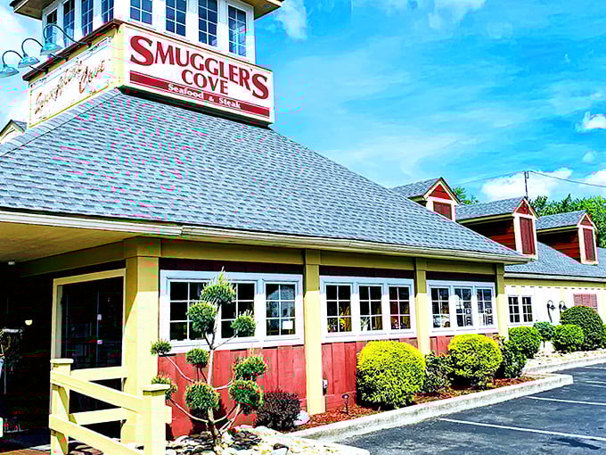 The coastal charm of Smuggler's Cove stands proudly in Tannersville, complete with its distinctive tower and welcoming wooden deck. A New England escape in Pennsylvania's mountain landscape.