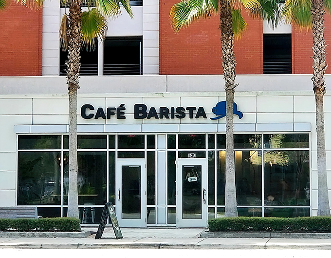 A sleek modern exterior that belies the breakfast wonders within. Café Barista's understated façade is like a poker player with a royal flush – keeping the good stuff hidden.