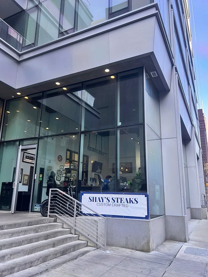 Behind this sleek glass facade lies Philadelphia's best-kept secret for premium steak sandwiches that redefine expectations.