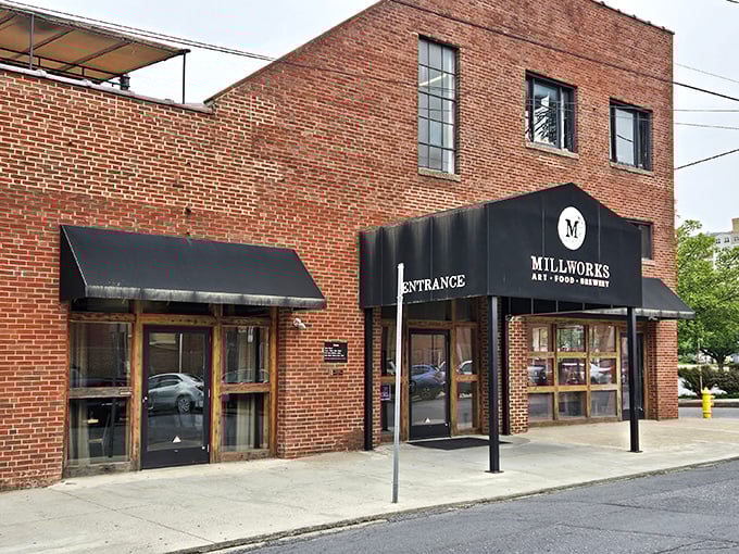 The brick fortress of flavor beckons from Harrisburg's Midtown. Those black awnings aren't just for show—they're inviting you to the culinary party inside.