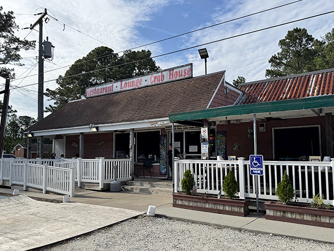The unassuming exterior of Margie & Ray's stands like a seafood speakeasy – no fancy frills, just the promise of crustacean treasures waiting inside.
