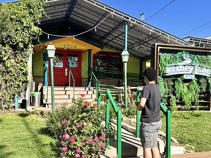The cheerful yellow exterior with its iconic red door feels like Austin's version of a warm hug – inviting you in before you've even parked.