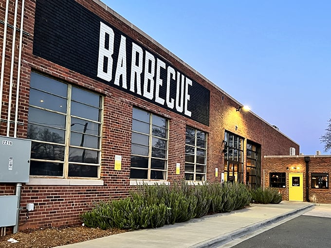 The bold "BARBECUE" declaration on this brick fortress isn't just signage—it's a promise that's kept with every smoky bite inside.