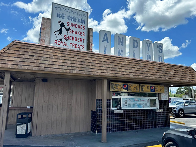 The iconic Andy's Igloo sign stands proud against the Florida sky, a beacon of frozen delights that's been calling to sweet-toothed travelers for generations.