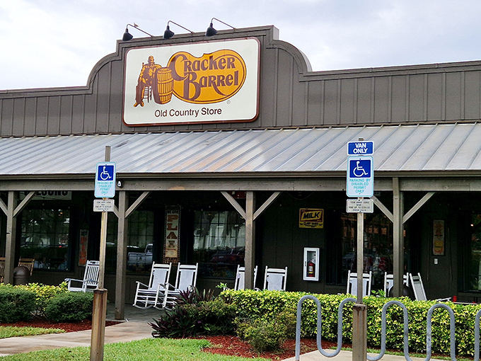 The iconic Cracker Barrel facade welcomes you like an old friend, complete with those signature rocking chairs practically begging for a pre-meal sit.
