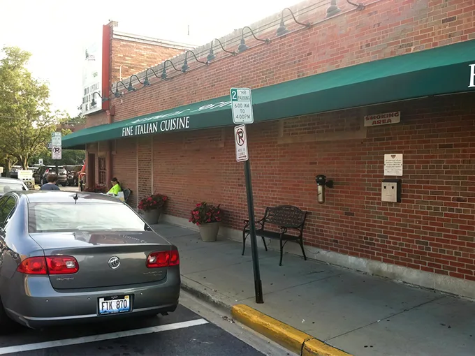That iconic green awning at Palermo's 95th isn't just a landmark—it's a beacon of hope for hungry souls seeking pizza salvation in Oak Lawn.