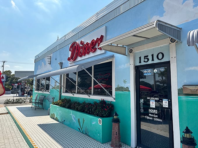 The turquoise beacon of breakfast bliss! Lighthouse Diner's vibrant exterior promises coastal charm and comfort food that's worth the morning pilgrimage.