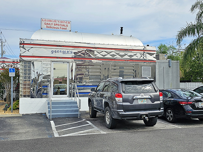 The gleaming stainless steel exterior of Georgie's Diner stands like a time machine to the golden age of roadside dining. Pure Americana awaits inside!