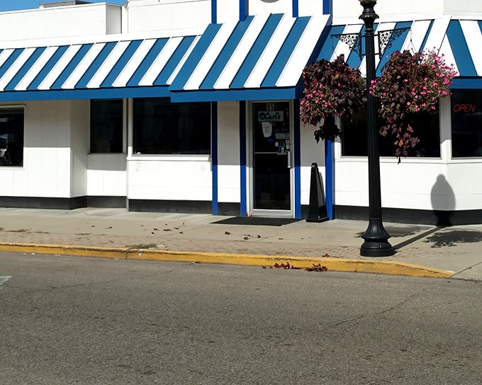 That blue and white awning isn't just decoration—it's a beacon of hope for hungry travelers on Ohio's backroads.