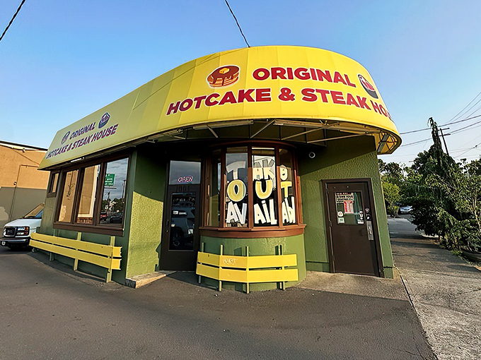 That curved yellow roof isn't just architecture – it's a breakfast beacon calling hungry souls home.
