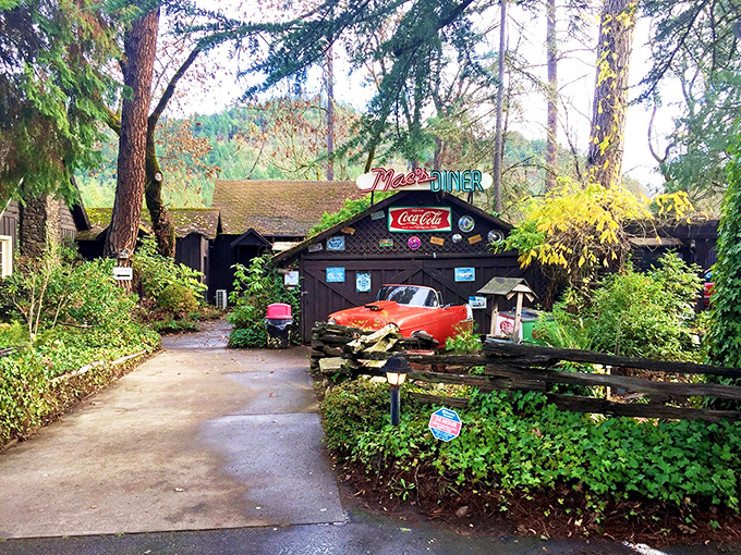 Time travel exists! Mac's vintage exterior with its classic car "crashing" through the front is Oregon's most creative welcome sign.